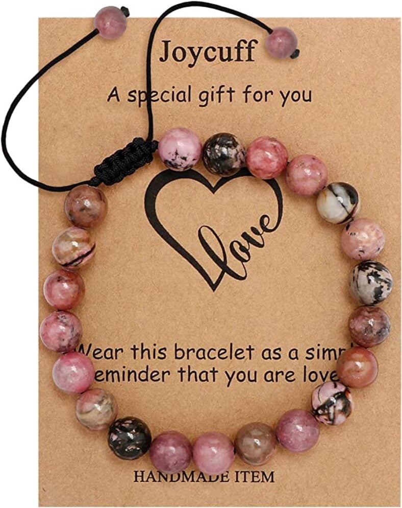 Do I Need Rhodonite? Meaning and Healing Properties - Symbol Sage